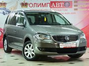 Volkswagen Touran I Рестайлинг 1.9d AT 105 л.с.дизель, передний