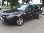 Nissan Almera II N16 Рестайлинг 1.8 AT 116 л.с.бензин, передний