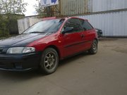 Mazda 323 V BA 1.3 MT 73 л.с.бензин, передний
