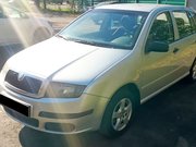 Skoda Fabia I Рестайлинг 1.2 MT 64 л.с.бензин, передний