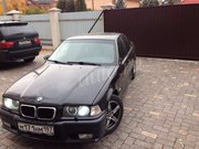 BMW 3er III E36 323i 2.5 MT 170 л.с.бензин, задний