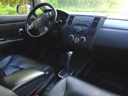 Nissan Tiida I 1.6 AT 110 л.с.бензин, передний