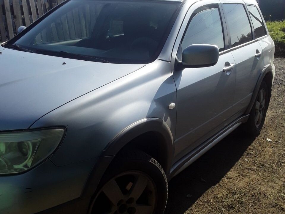 Купить б/у Mitsubishi Outlander I 2.4 AT (160 л.с.) 4WD бензин автомат ...