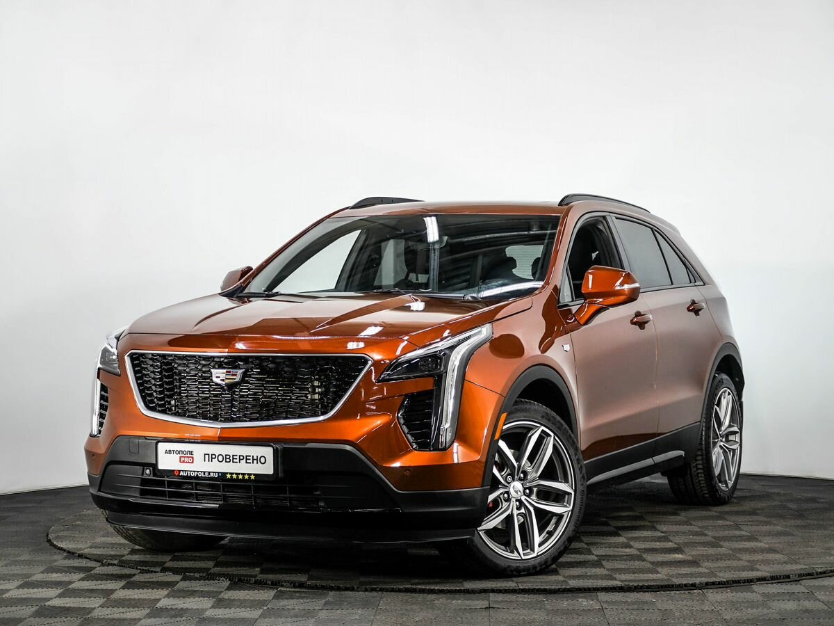 Купить б/у Cadillac XT4 I 2.0d AT (174 л.с.) 4WD дизель автомат в Санкт-Петербурге: оранжевый ...