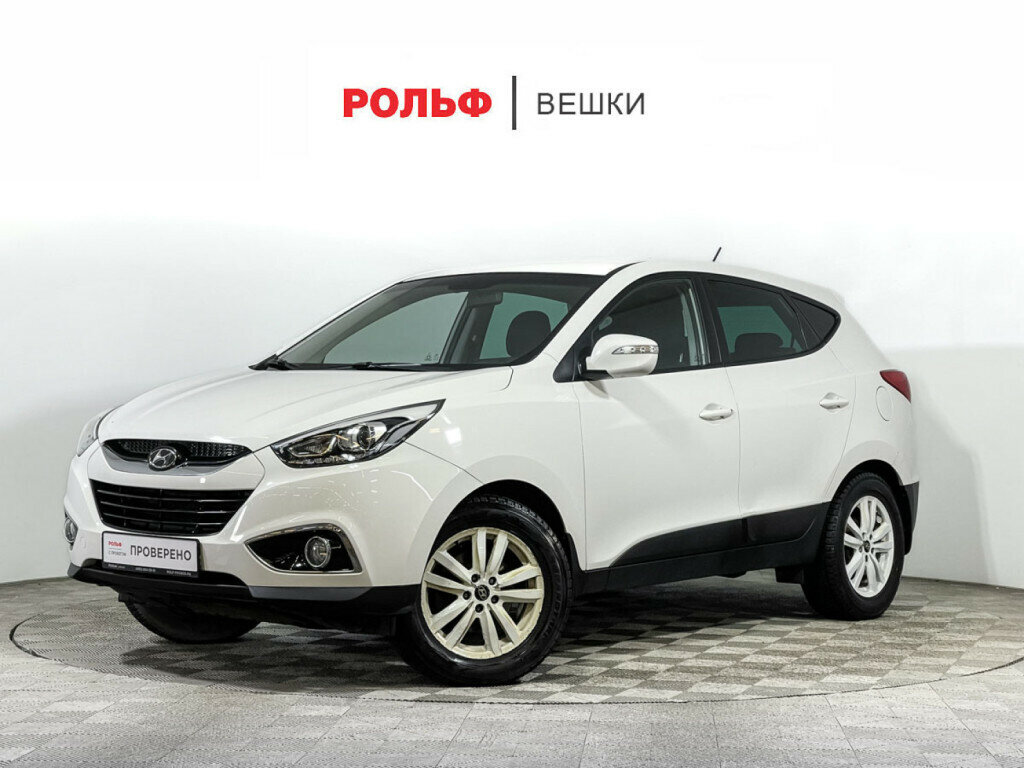 Купить б/у Hyundai ix35 I Рестайлинг 2.0 AT (150 л.с.) 4WD бензин автомат в Москве: белый Хендэ ...