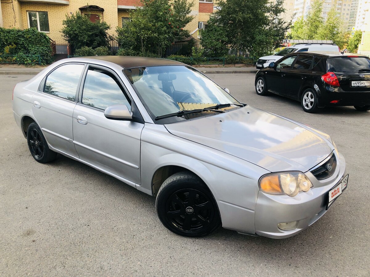 Купить б/у Kia Shuma II 1.6 AT (101 л.с.) бензин автомат в Шушарах: серый Киа Шума II лифтбек ...