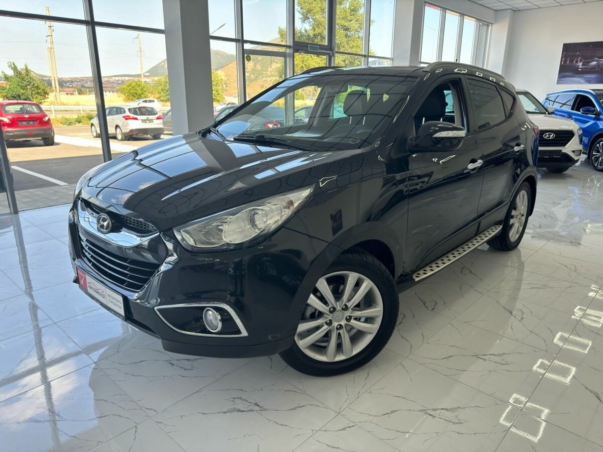 Купить б/у Hyundai ix35 I 2.0 AT (150 л.с.) 4WD бензин автомат в Винсадах: чёрный Хендэ ix35 I ...