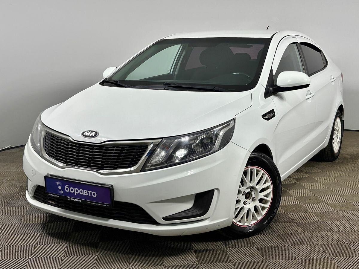 Купить б/у Kia Rio III 1.4 MT (107 л.с.) бензин механика в Борисоглебске: белый Киа Рио III ...