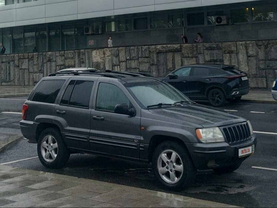 Купить б/у Jeep Grand Cherokee II (WJ) 4.7 AT (258 л.с.) 4WD бензин автомат в Москве: серый Джип ...