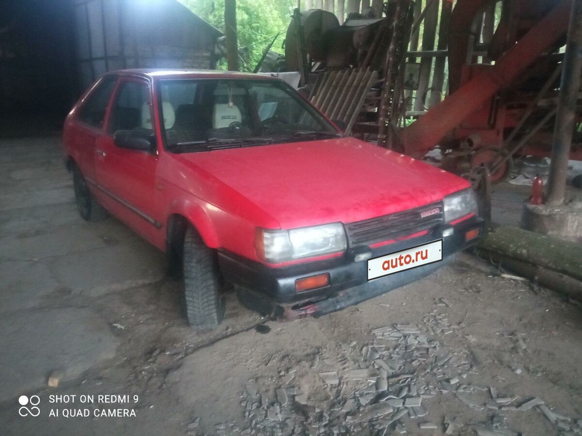 Купить б/у Mazda 323 III (BF) 1.3 MT (60 л.с.) бензин механика в Немане: пурпурный Мазда 323 III ...