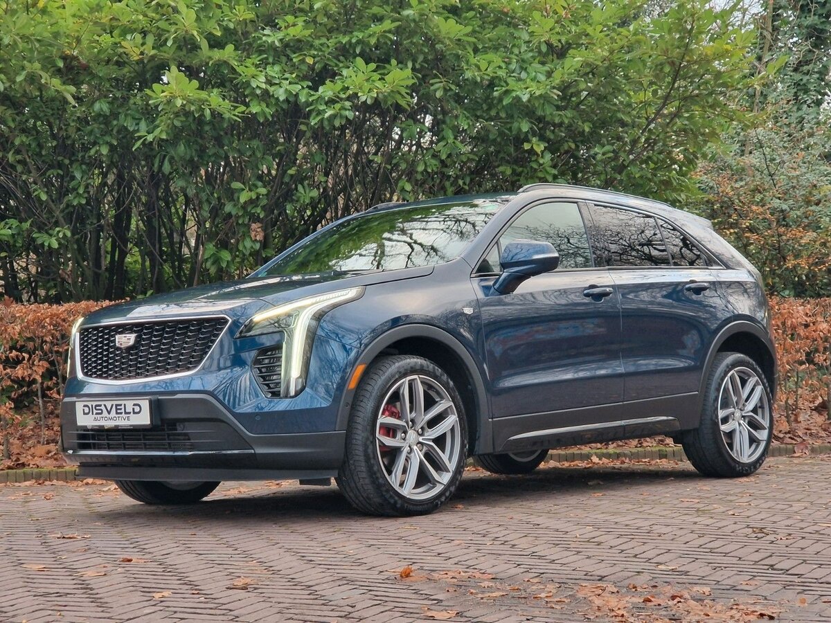 Купить б/у Cadillac XT4 I 2.0 AT (241 л.с.) 4WD бензин автомат в Хабаровске: синий Кадиллак ХТ4 ...