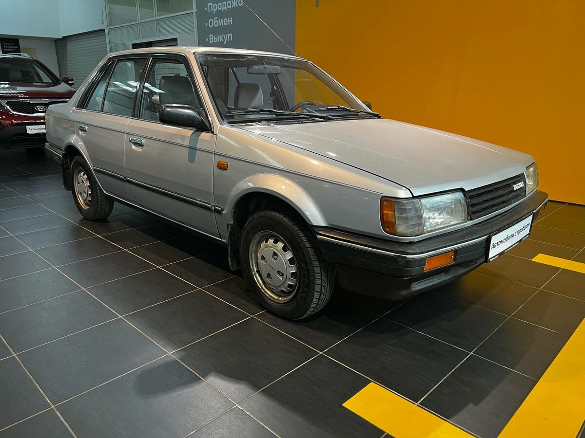 Купить б/у Mazda 323 III (BF) 1.5 MT (75 л.с.) бензин механика в Сыктывкаре: серебристый Мазда ...