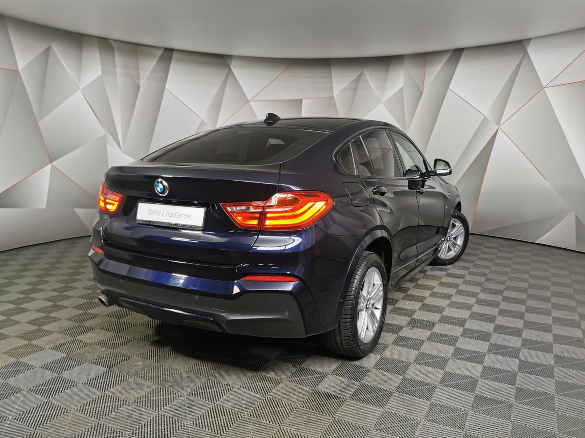 Купить б/у BMW X4 I (F26) 20i 2.0 AT (184 л.с.) 4WD бензин автомат в Москве: чёрный БМВ Х4 I ...