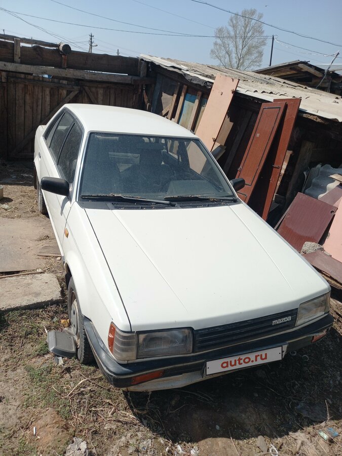 Купить б/у Mazda 323 III (BF) 1.5 MT (95 л.с.) бензин механика в Каргале: белый Мазда 323 III ...