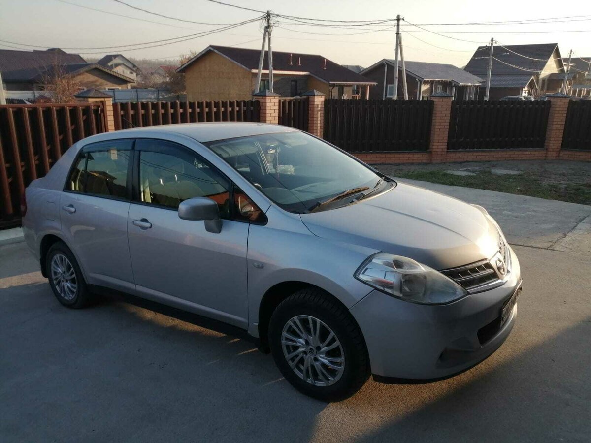 Купить б/у Nissan Tiida I Latio 1.5 AT (109 л.с.) 4WD бензин автомат в ...
