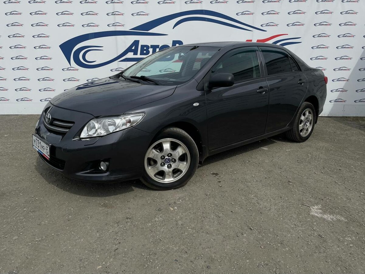 Купить б/у Toyota Corolla X (E140, E150) 1.6 AT (124 л.с.) бензин автомат в Кургане: серый ...