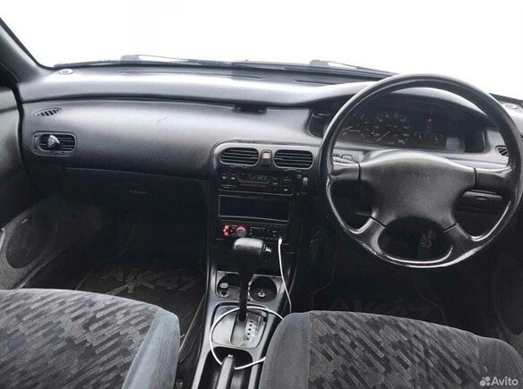 Купить б/у Mazda Autozam Clef 1992-1994 2.5 AT (200 л.с.) бензин ...
