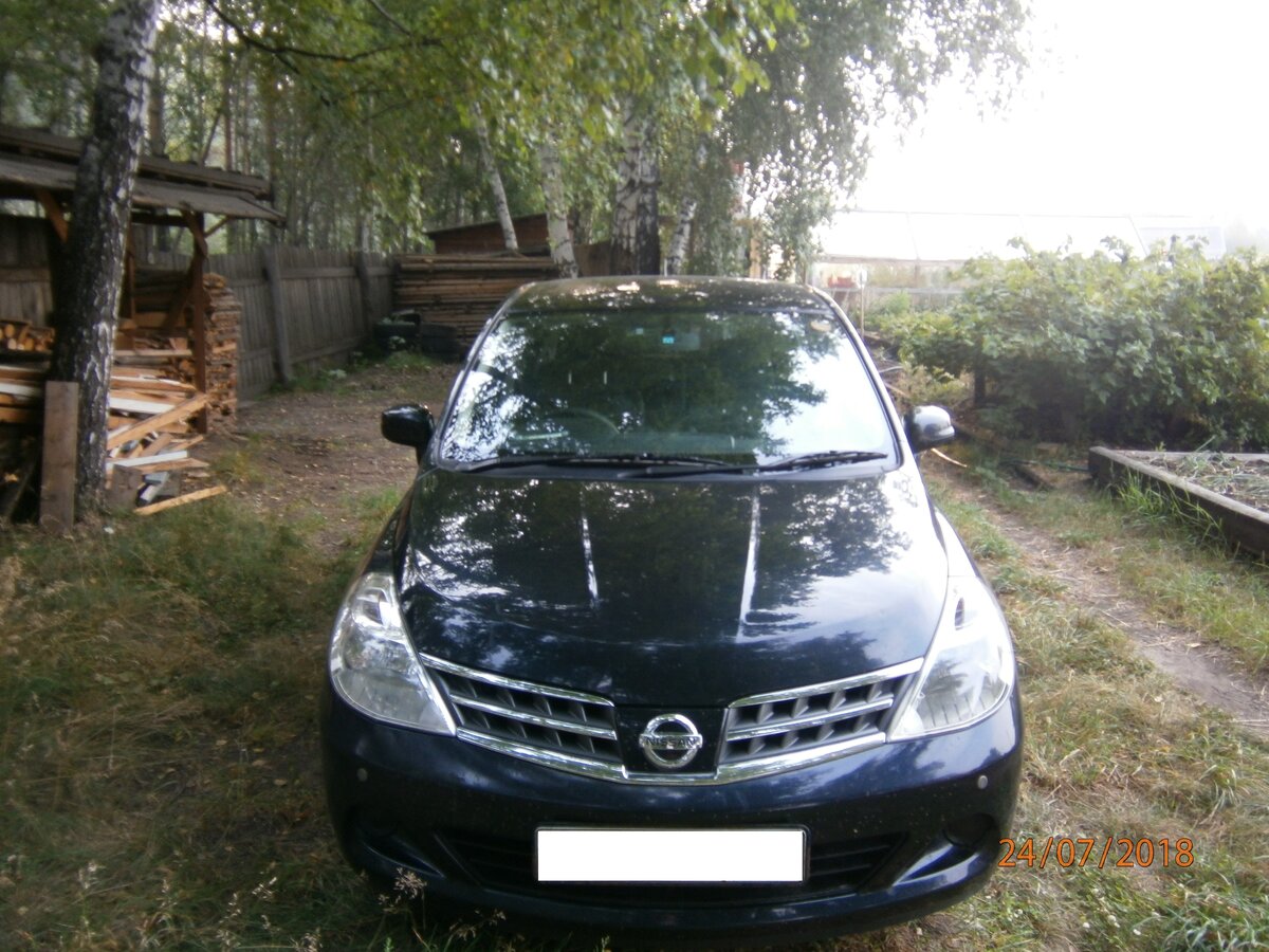 Купить б/у Nissan Tiida I Рестайлинг 1.6 AT (110 л.с.) бензин автомат в Красноярске: чёрный ...