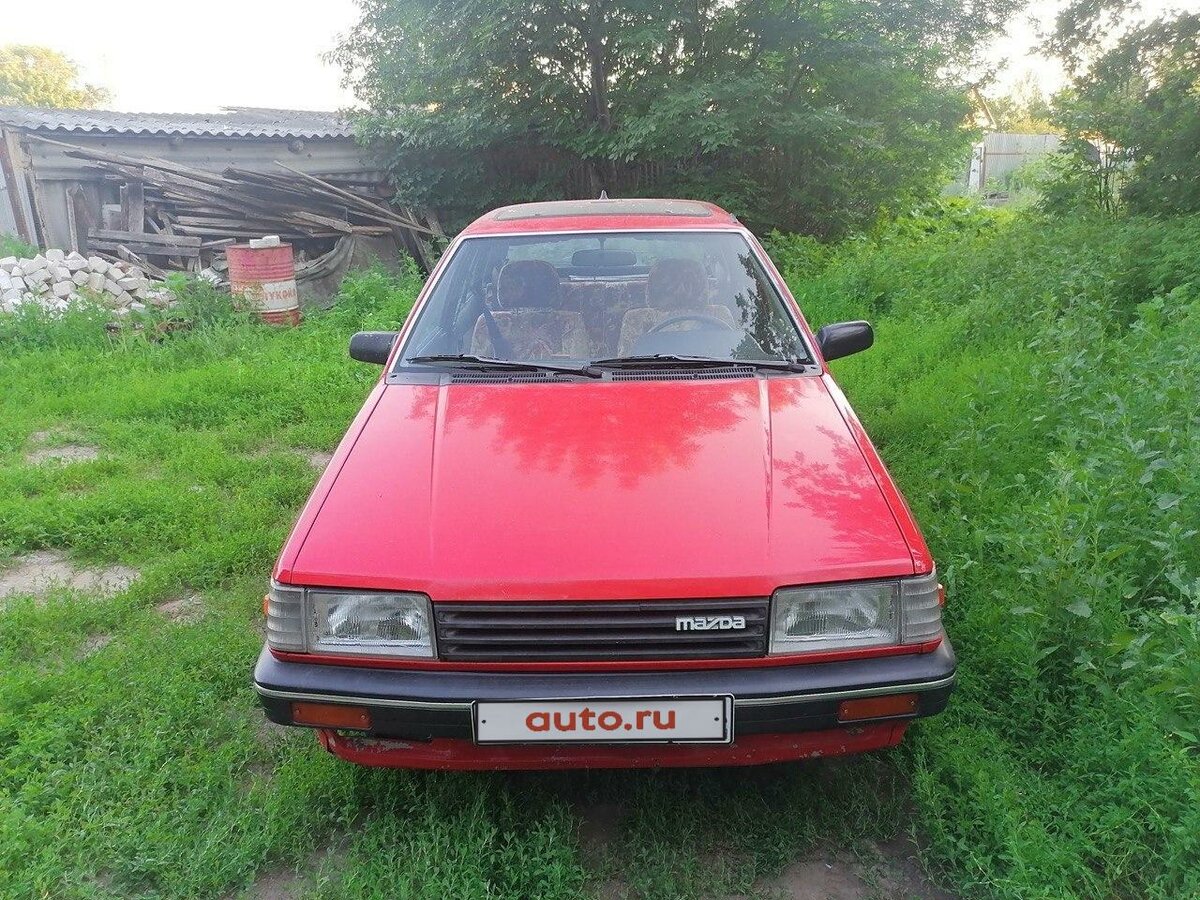 Купить б/у Mazda 323 III (BF) 1.3 MT (60 л.с.) бензин механика в Учхозе: красный Мазда 323 III ...