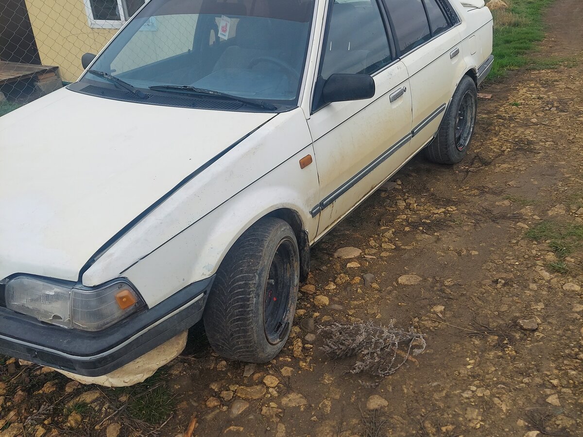 Купить б/у Mazda 323 III (BF) 1.5 MT (115 л.с.) бензин механика в Анапе: белый Мазда 323 III (BF ...