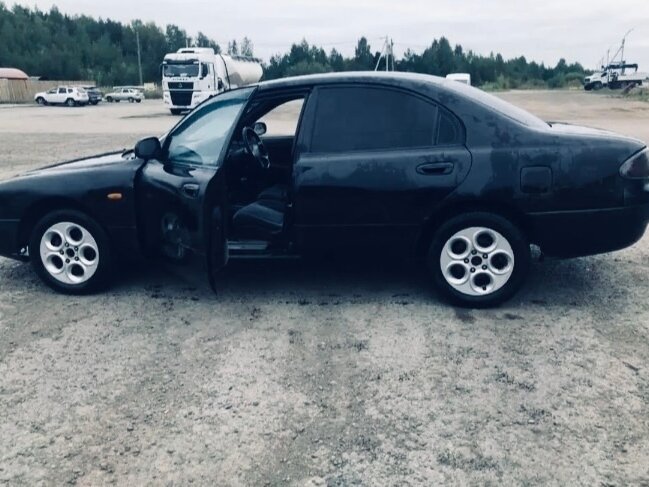 Купить б/у Mazda Autozam Clef 1992-1994 2.5 AT (200 л.с.) бензин ...