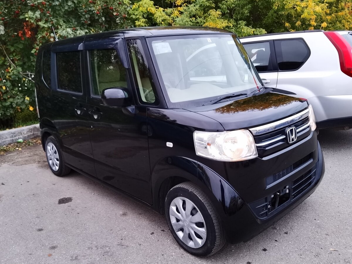 Купить б/у Honda N-BOX I Рестайлинг 0.7 CVT (58 л.с.) бензин вариатор в Иркутске: чёрный Хонда н ...