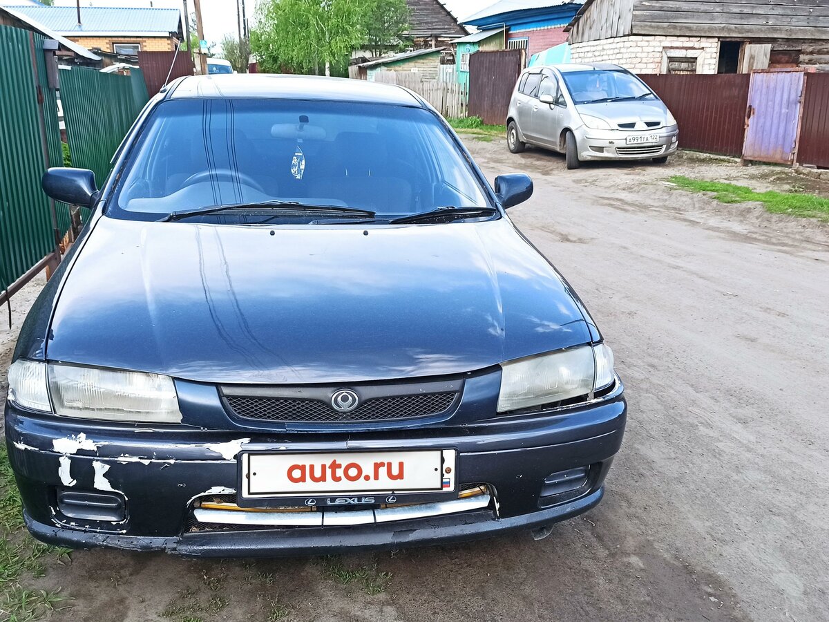 Купить б/у Mazda Familia VII (BH) 1.5 AT (110 л.с.) бензин автомат в ...