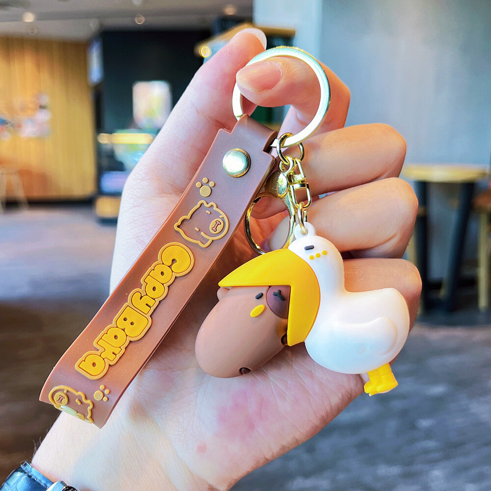 Креативный брелок-кукла из серии «Капибара», милый 3D-брелок с капибарой, подвеска для сумки для пары, кулон с капибарой, капибара, поедающая гуся