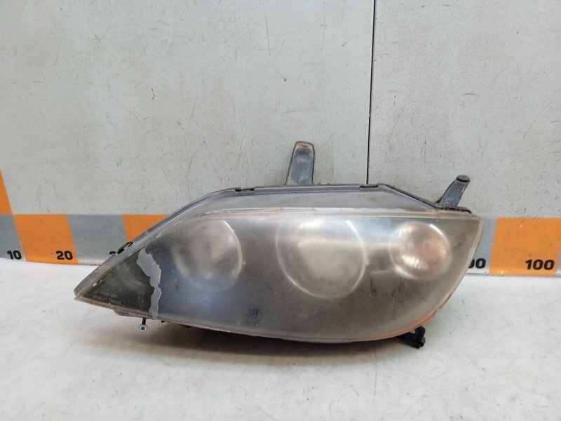 Б/У не штатный ксенон, оригинал, Мазда Демио DY Фара левая Mazda Demio 2002 DY 345221 MAZDA арт. D39151041