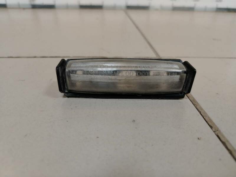 Фонарь подсветки номера Toyota Camry XV30 2001-2006