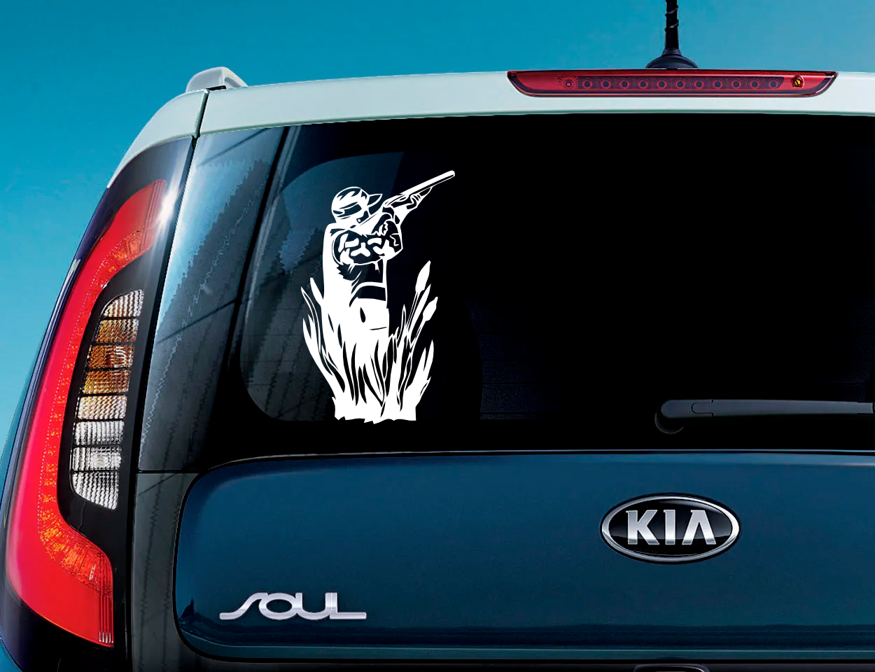 Автонаклейка "Skoda Studio - Охотник в камышах", M: 15 см x 25 см, белая, виниловая GRAFIX500 (Avery)