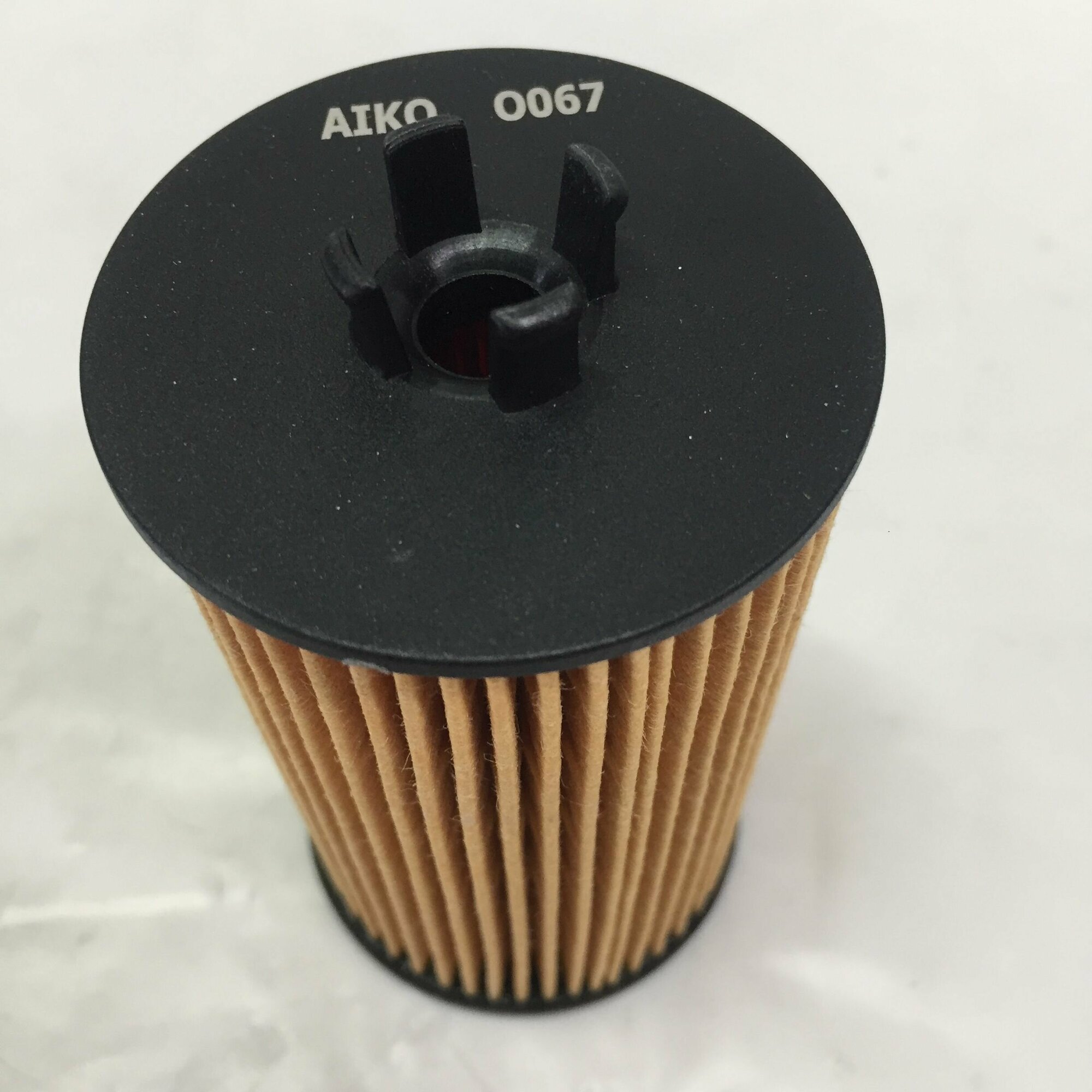 Фильтр масляный AIKO O067 Aveo Cruze Astra Corsa 2008- OEM 55353324