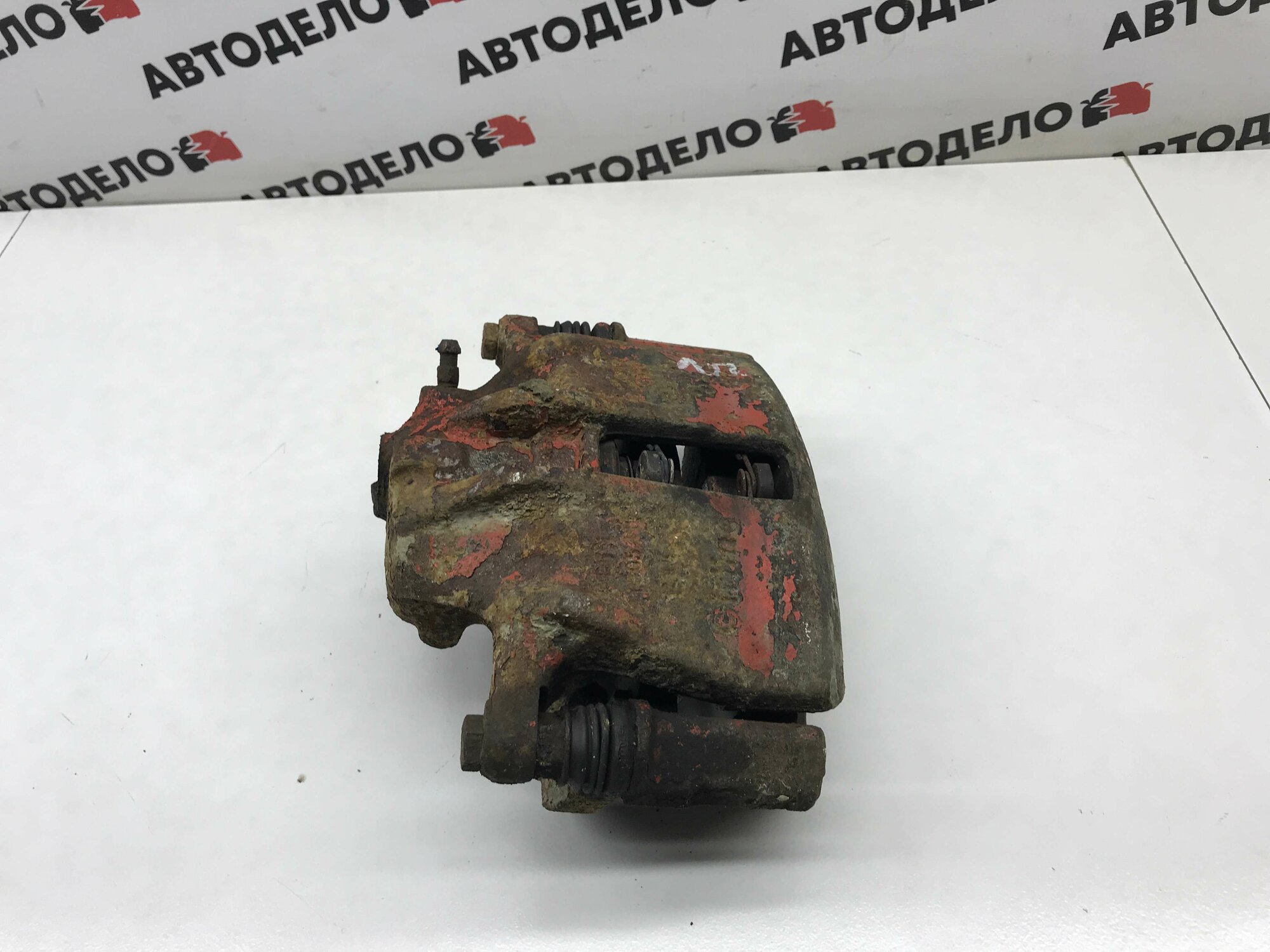 Суппорт тормозной п/л Volkswagen Passat B3 1987 г.