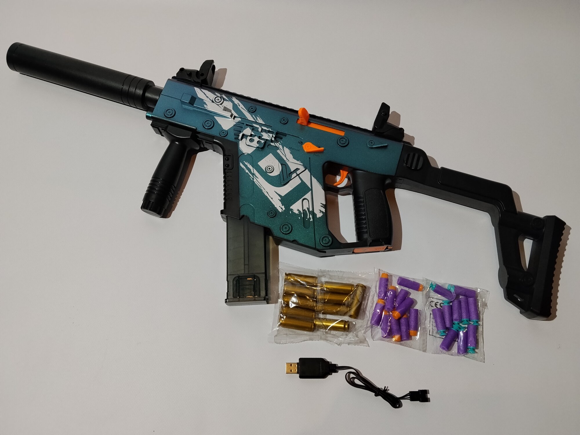 Автомат детский на аккумуляторе, стреляет очередью мягкими пулями с гильзами, с прицелом