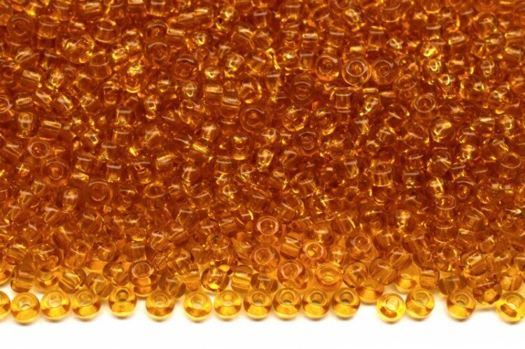 Бисер чешский PRECIOSA круглый 10/0 10050 янтарный прозрачный, 1 сорт, 50г