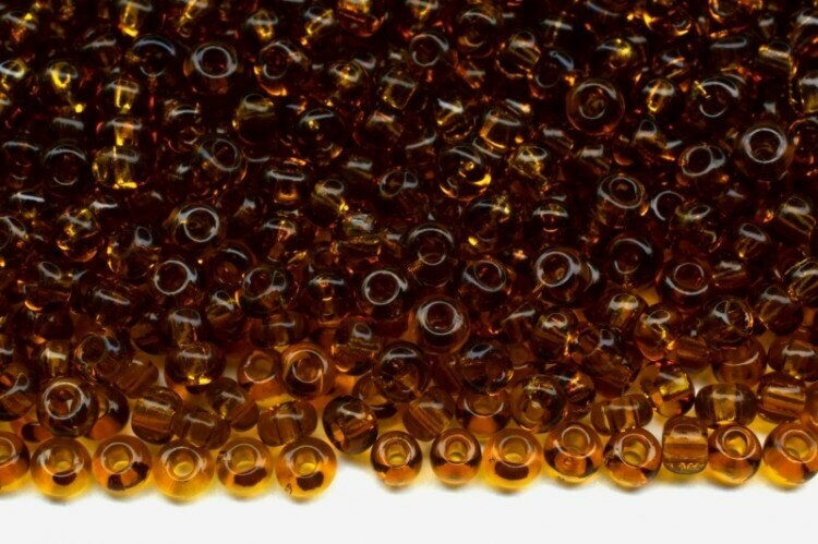 Бисер чешский PRECIOSA круглый 10/0 10090 коричневый прозрачный, 2 сорт, 50г