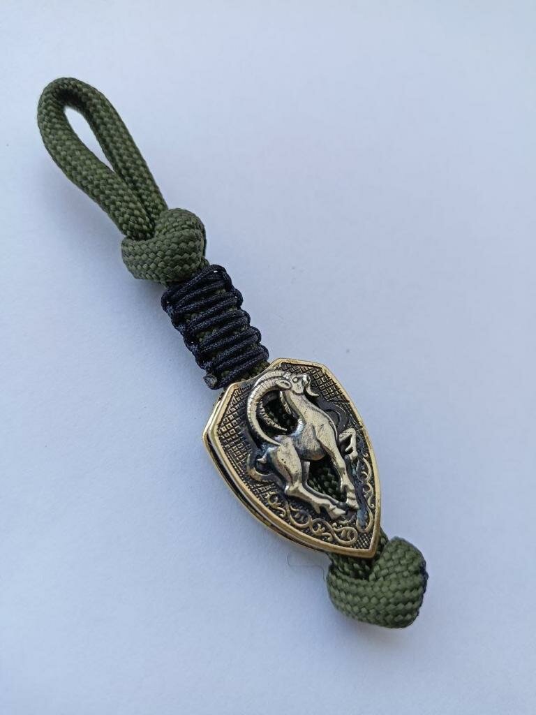 Темляк с бронзовой бусиной Козерог