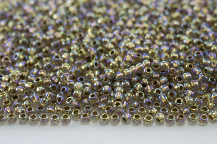 Бисер японский TOHO круглый 15/0 #0994 хрусталь радужный, золотая линия внутри, 10 грамм