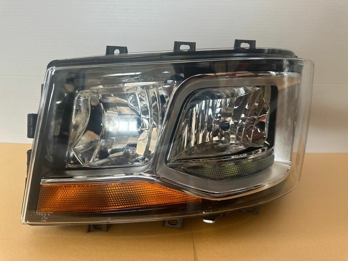 Фара головного света левая SCANIA 6 -series 6 серии с ДХО электрорегулировка (скания)