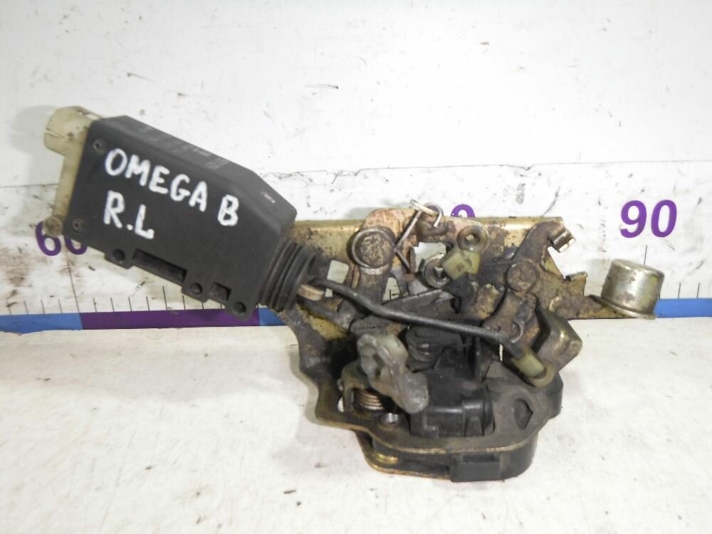Замок двери задней левой Opel Omega B 90542057