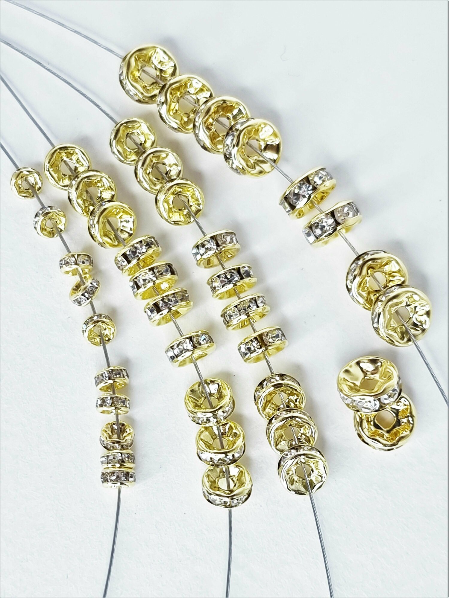 Бусины-Рондели со стразами. 4,6,8мм. 40шт. Цвет золото.