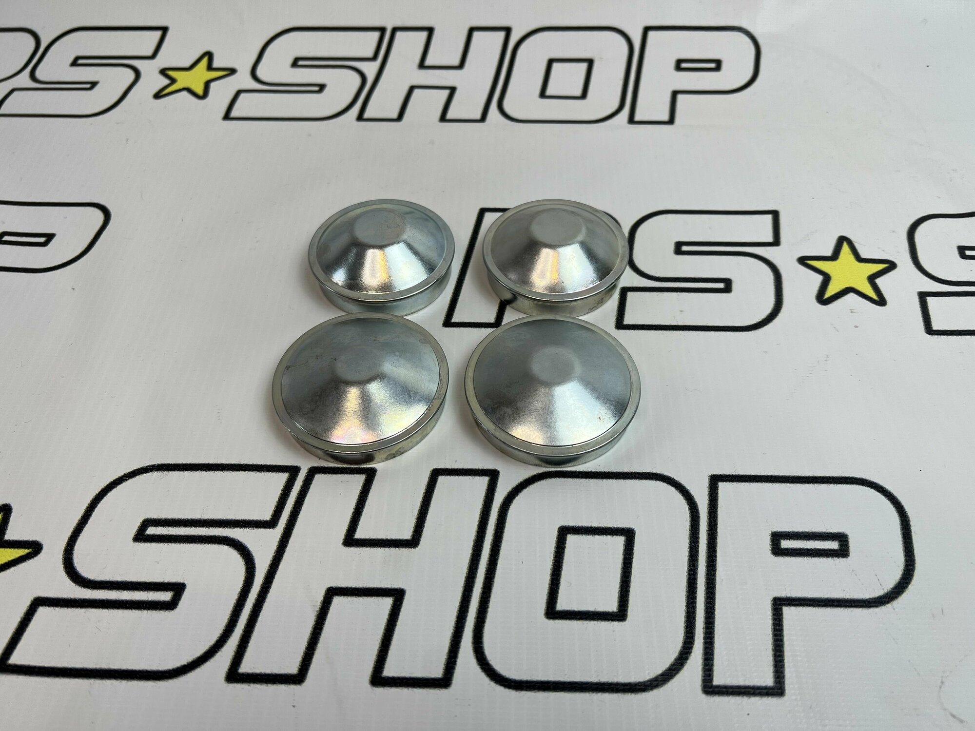 Колпачок ступицы переднего/заднего колеса (металл) Vesta / Xray / Largus / комплект (4 шт.)