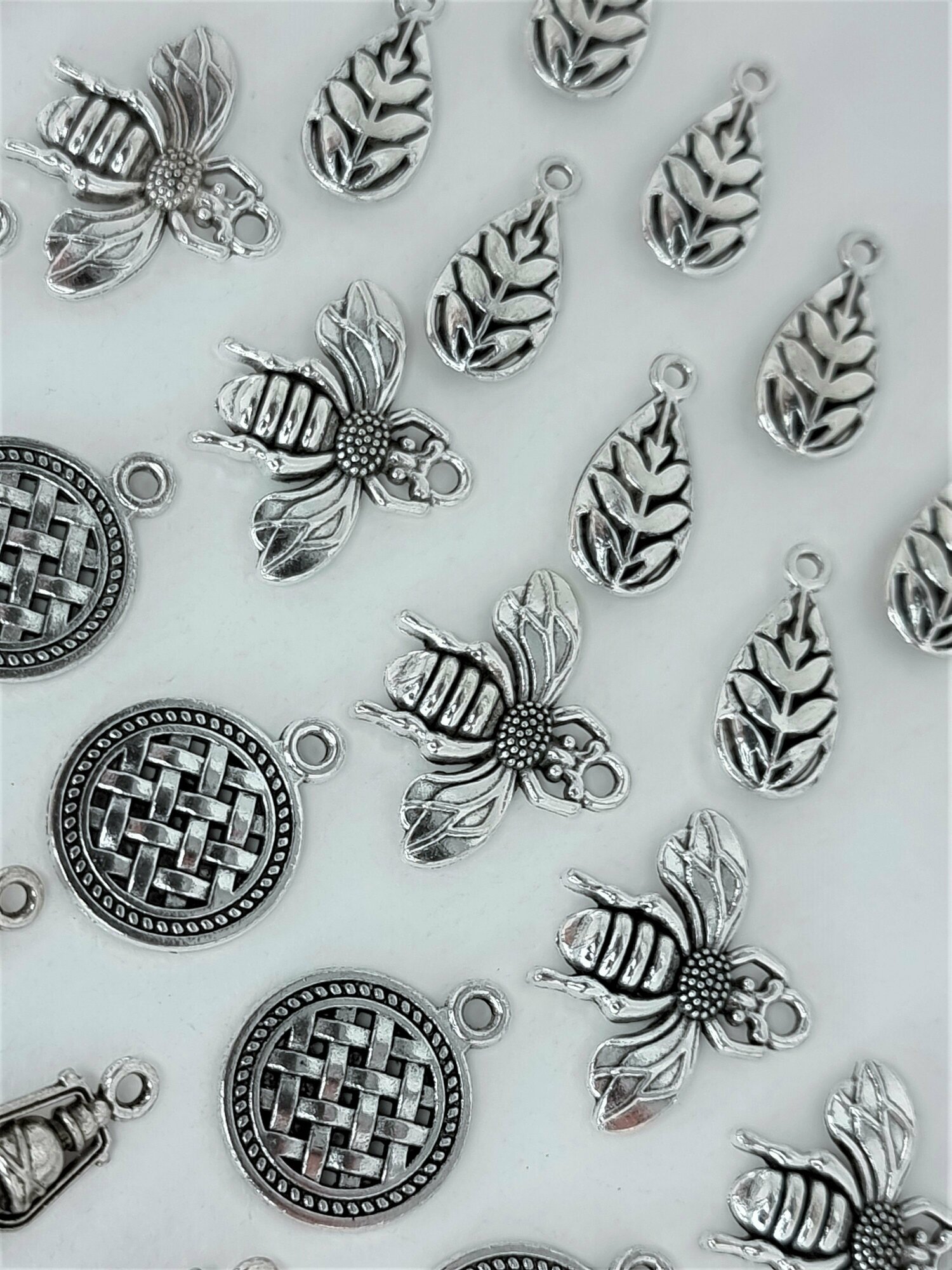 Металлические подвески 14-24мм. Цвет Родий. № 36. 57шт.