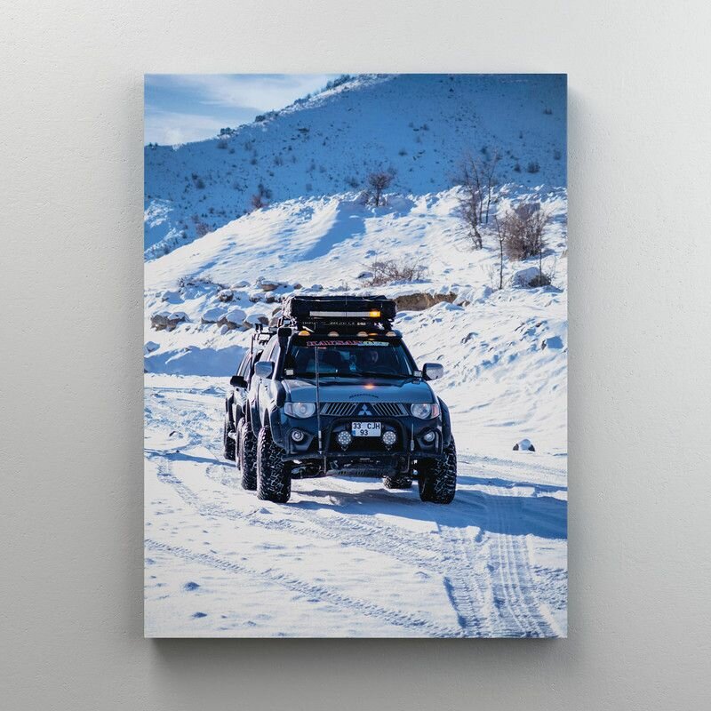 Интерьерная картина на холсте "Внедорожник в заснеженных горах - Mitsubishi L200" размер 45x60 см