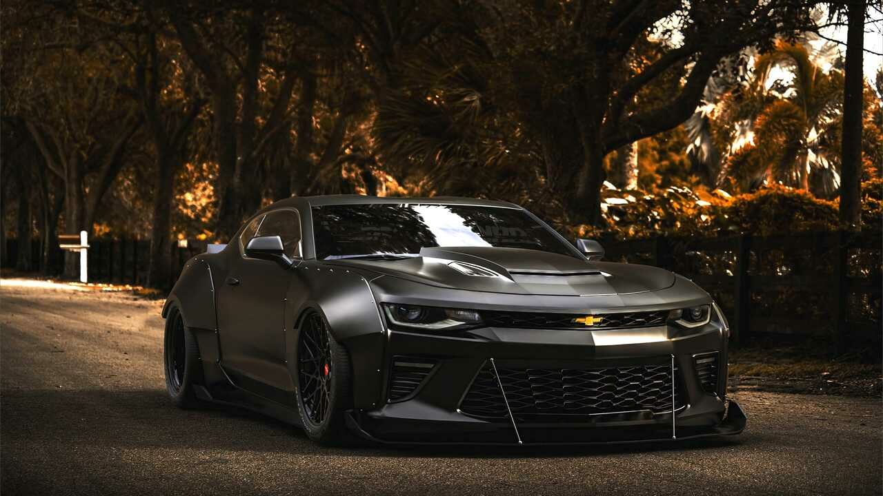 Картина на холсте 60x110 LinxOne "Black Camaro Chevrolet" интерьерная для дома / на стену / на кухню / с подрамником