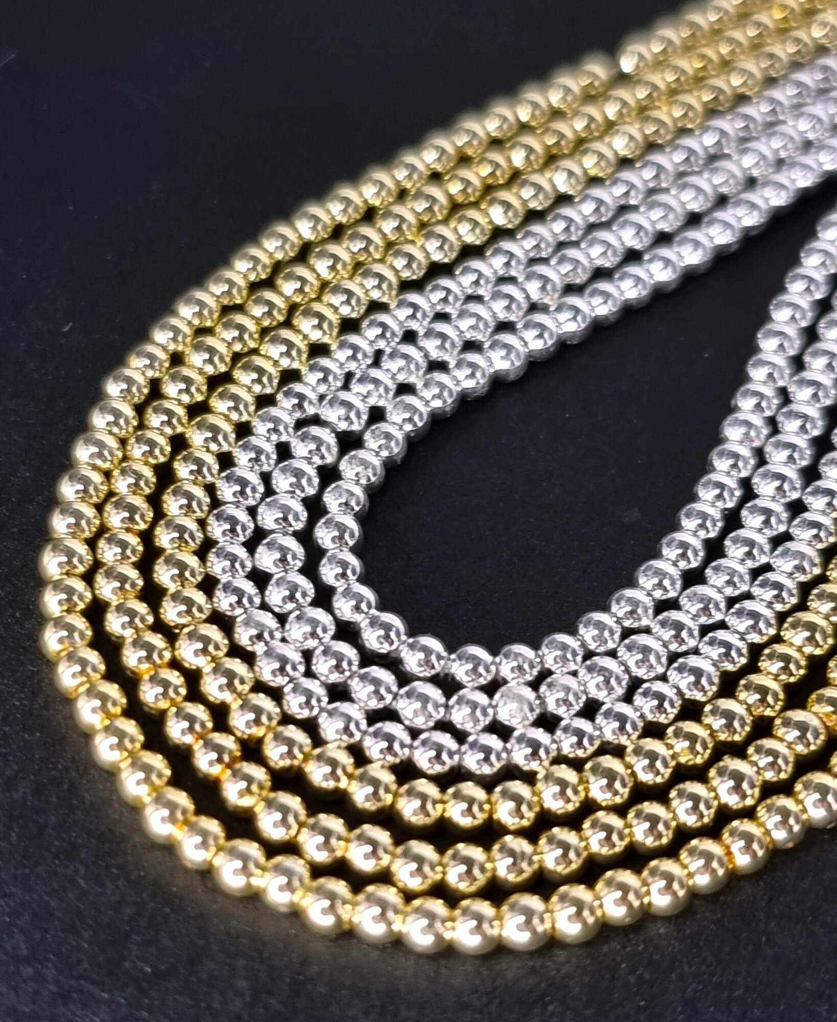 Гематит мелкий. d 2мм. 2нити по 20см. Золото и серебро.