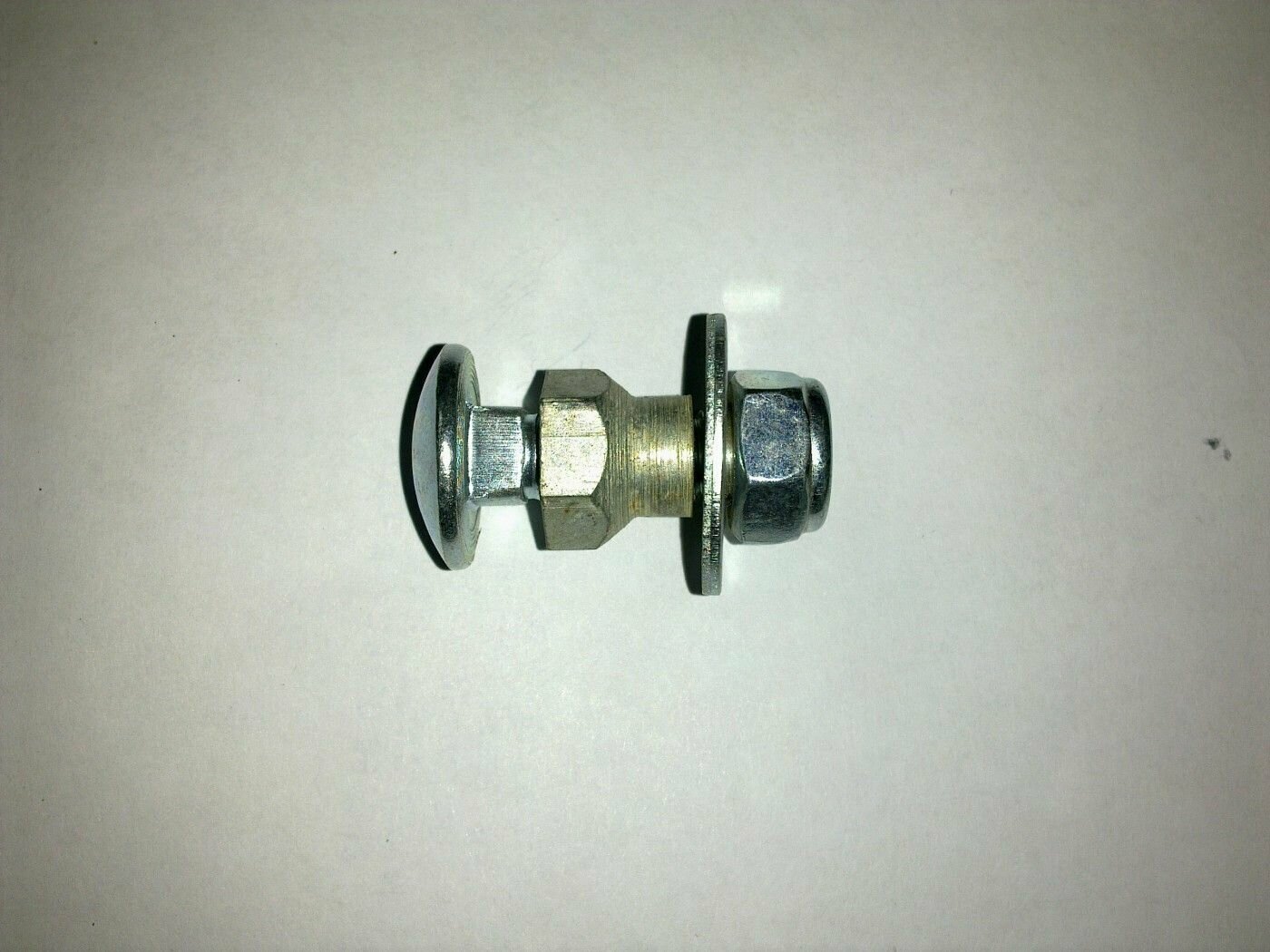 Болт крепления двигателя снегохода Буран короткий в сборе