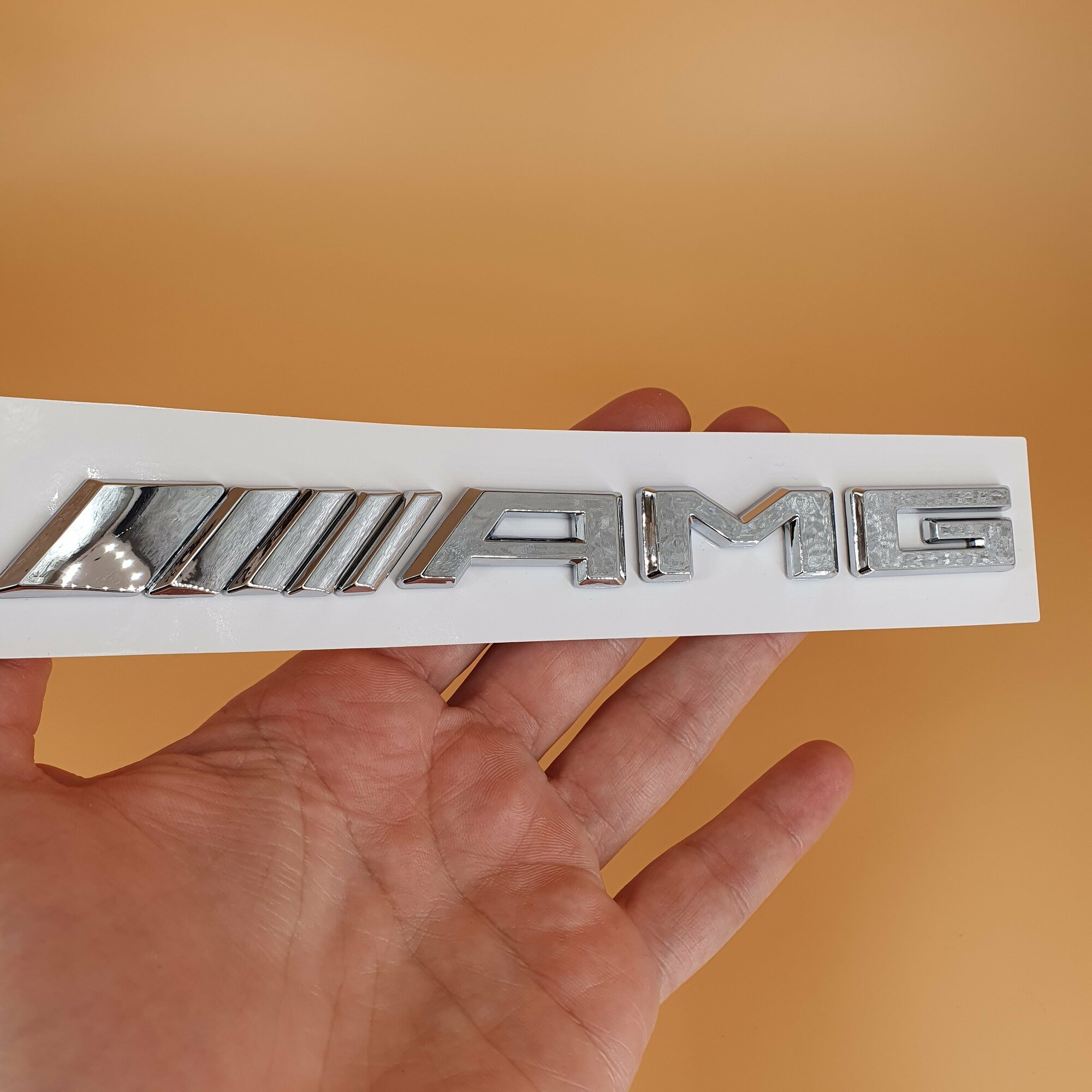 Эмблема AMG для Мерседес пластиковая 19 х 1.8 см объёмная хромированная