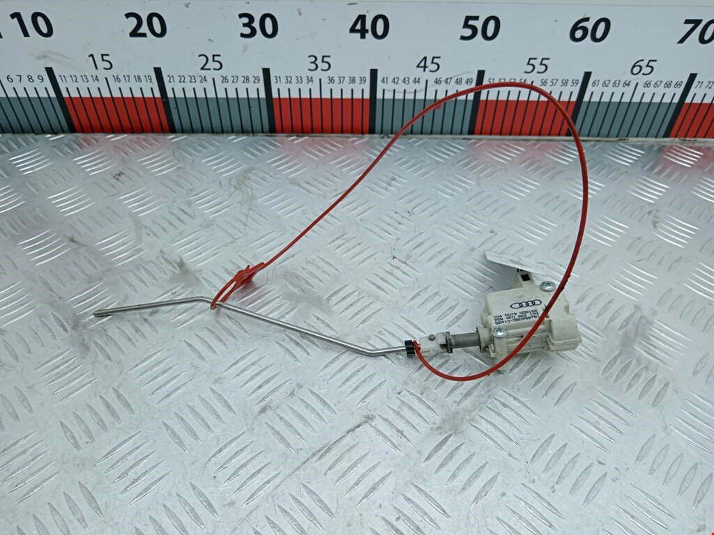 Сервопривод (электропривод моторчик привода) лючка бензобака Audi A6 C6 4F0862153 арт. 1817824