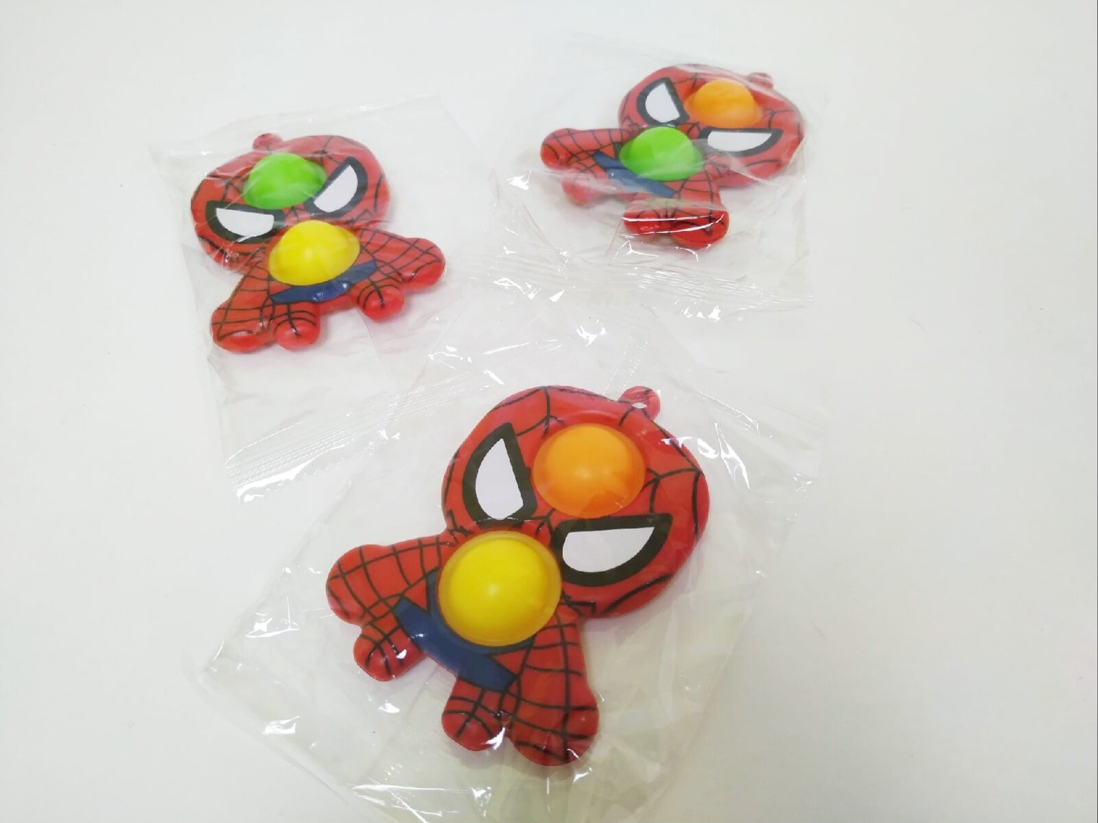 Сенсорная игрушка симпл-димпл 2 супергерои антистресс разноцветный